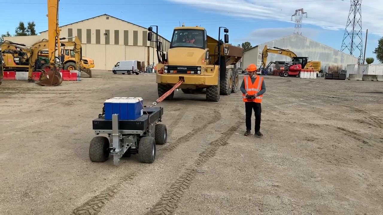 Robot de manutention pour transport naval et ferroviaire